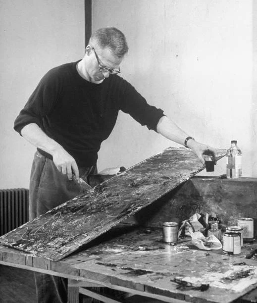 PAINTER WILLIAM CONGDON cutting the surface of the painting w- 1940s ...