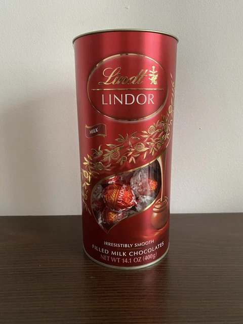 LINDT LINDOR IRRESISTIBLY Smooth Filled Milk Chocolates 400g Tube £7.99 ...