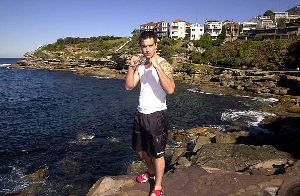 ROBBIE WILLIAMS AT Bondi Beach on July 22, 2000 in Sydney, Austral ...