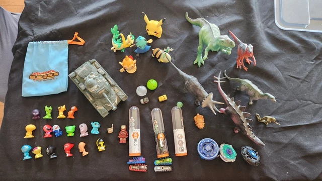 ASSORTED TOY LOT including dinosaurs, Pokémon figures, and Crazy Bone ...