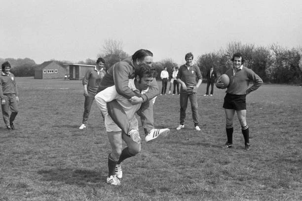 JOHN DAWES, BRITISH Lions captain, gives a piggyback ride to t- 1971 ...