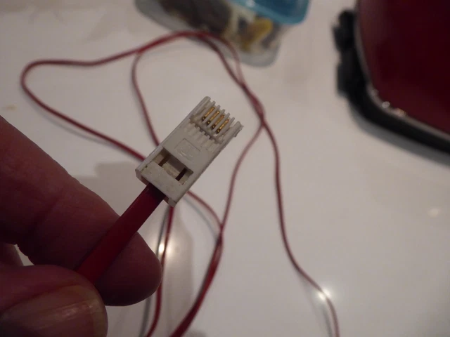 DIRECT LINE ADVERTISING Red Push-Button Telephone With Wheels Believed ...