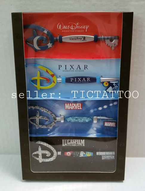 LOT DE 4 clés Disney Store Walt Disney Studios, Pixar Studios, Marvel ...
