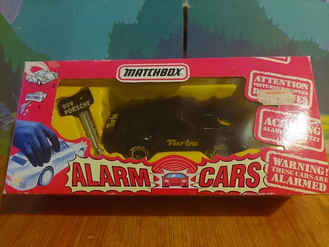 MATCHBOX ALARM CARS Black Porsche 959, complete with key and original ...