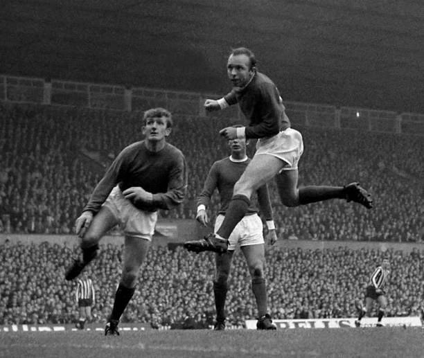 MANCHESTER UNITED'S GOALKEEPER Alex Stepney looks on anxiously- 1968 ...