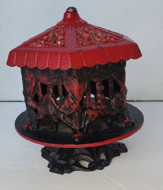 ANTIQUE CAST IRON Spinning Carousel Merry-Go-Round Penny Coin Bank £54. ...