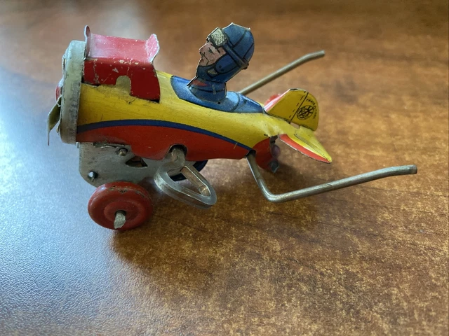 VINTAGE SUZUKI STUNT Flyer Wind-Up Tin Airplane $20.00 - PicClick CA