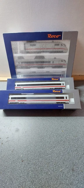 ROCO ICE TRAIN set. 3 part set with two passenger coaches. current erea ...