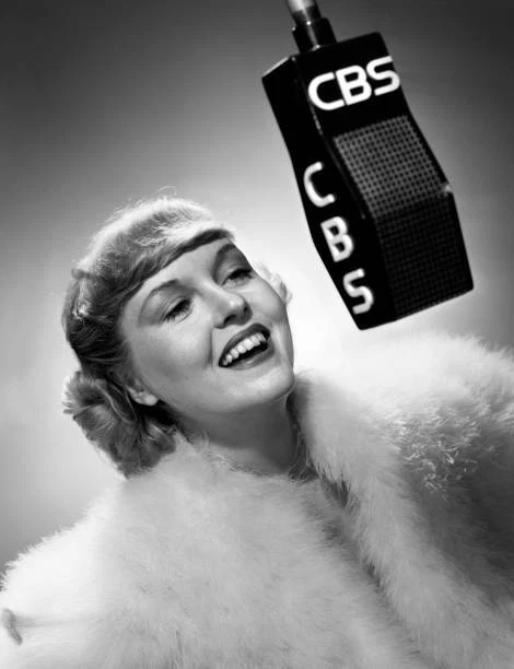PORTRAIT OF ACTRESS and singer Patricia Ellis with a microphone 1940s ...