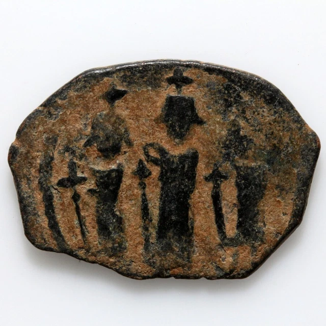 ARAB PSEUDO-BYZANTINE COIN-AE fals-circa 600-700 A.D-3 figures standing ...