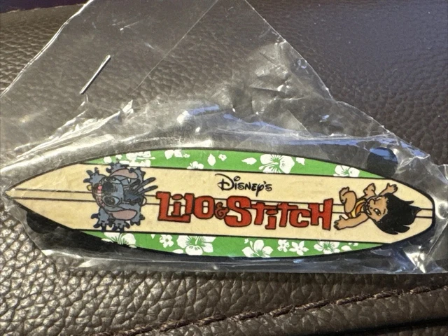 DISNEY AUCTIONS P.I.N.S. Lilo & Stitch Logo Surfboard LE 5000 Pin $15. ...