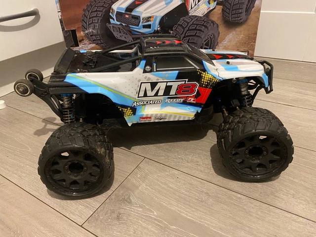 TEAM ASSOCIATED RIVAL MT8 1/8 scale Rc car ROLLER Blue And Black £161. ...